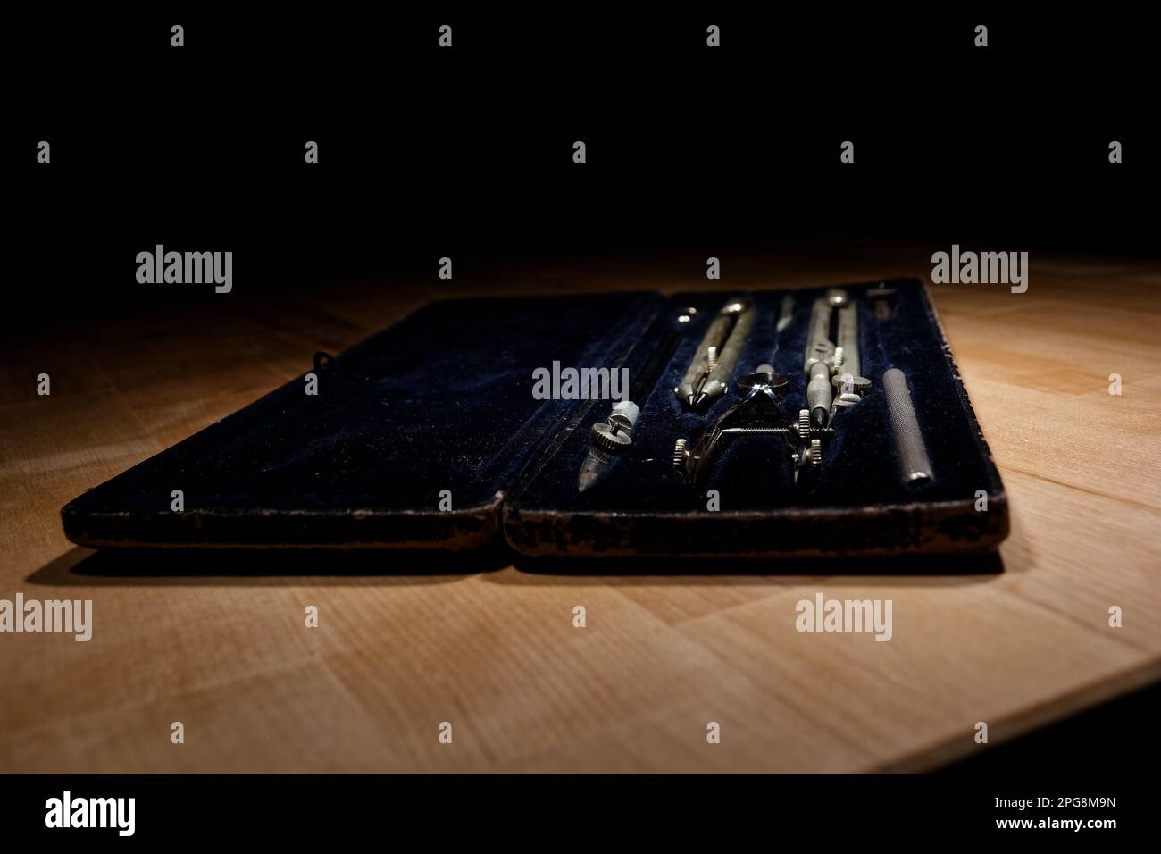 set of divider, compass inside a box for geometric construction lying ...