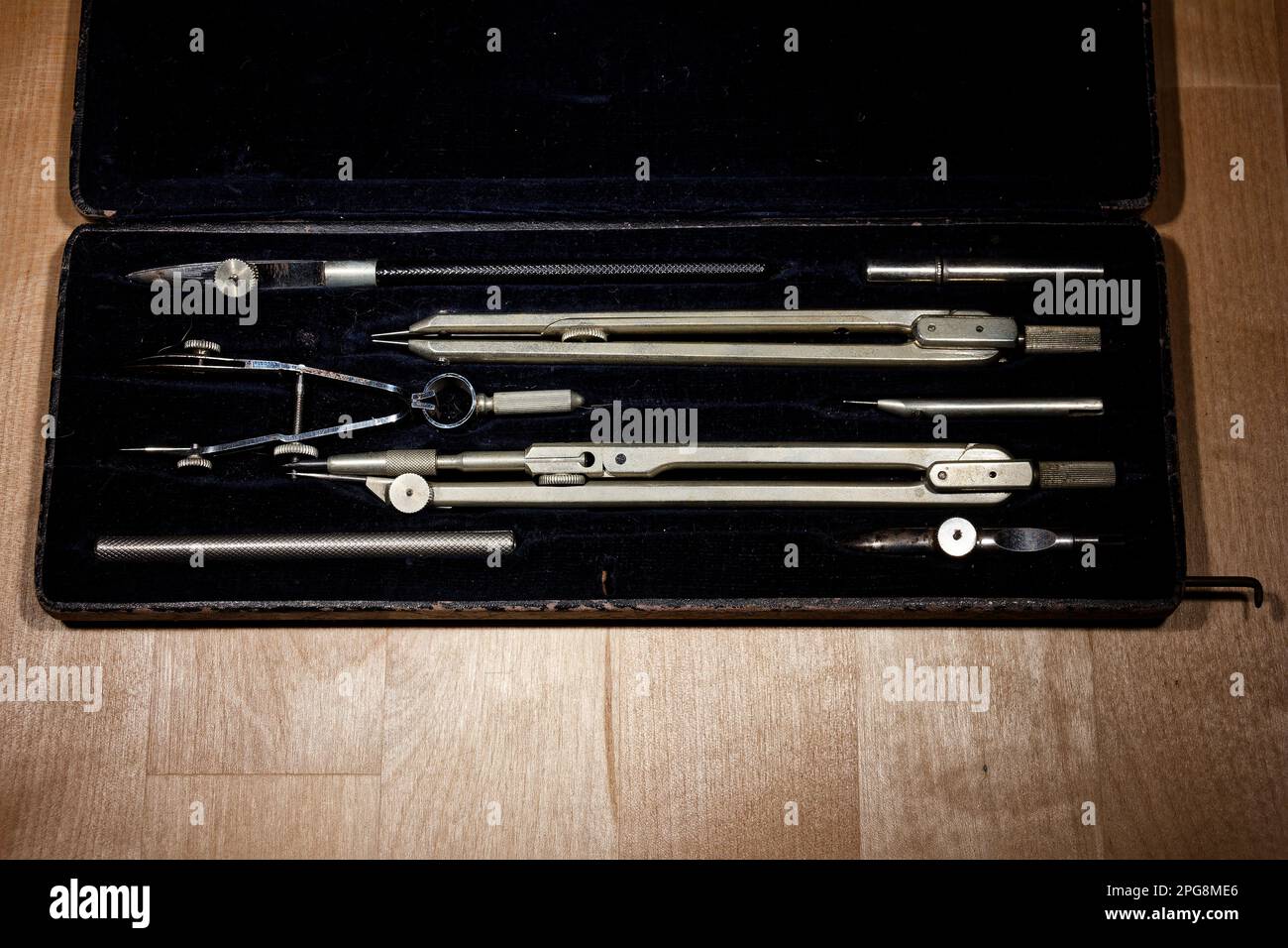 set of divider, compass inside a box for geometric construction lying ...