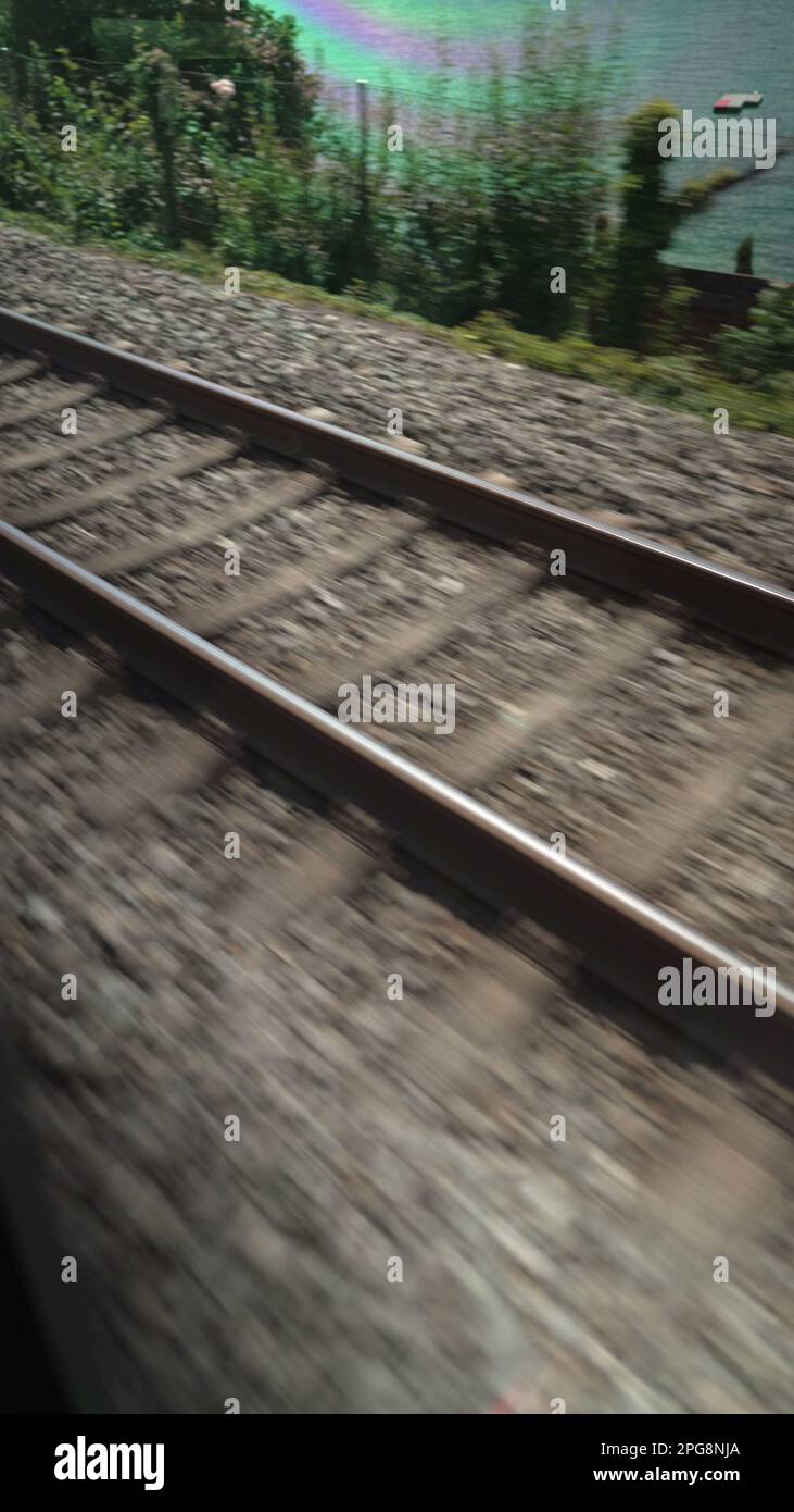 Train railroad tracks in motion high speed velocity seen through window ...