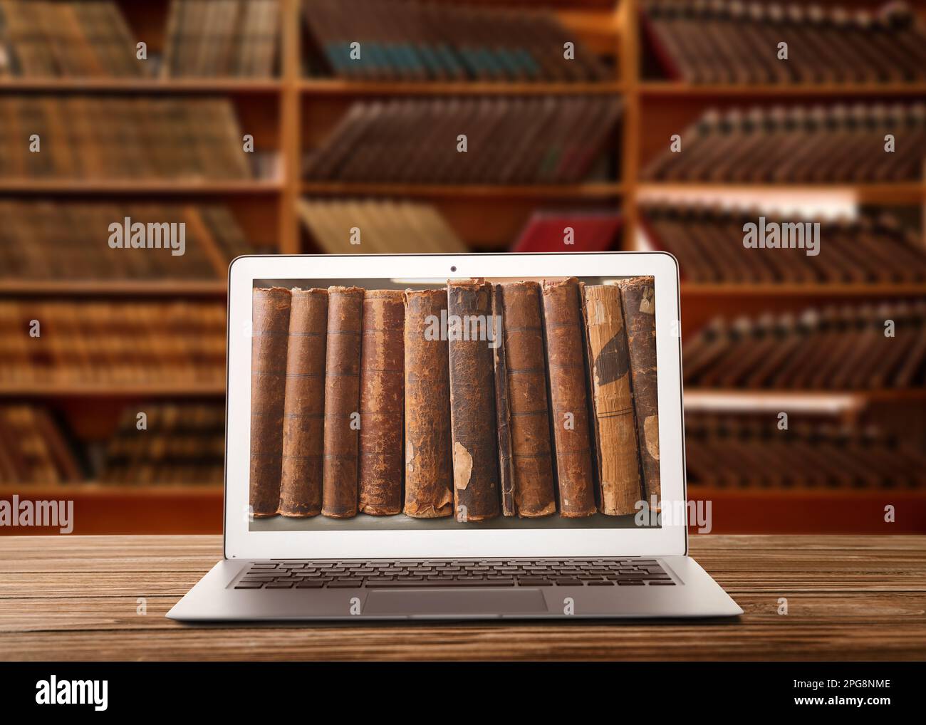 Laptop with book shelves hi-res stock photography and images - Alamy