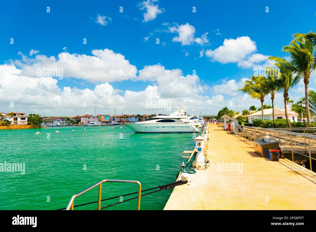 summer yacht in harbour with promenade pier. photo of harbour with pier ...