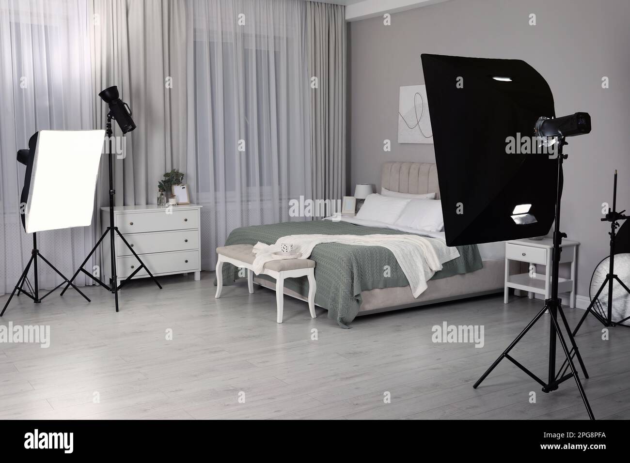 Professional photo studio equipment prepared for shooting bedroom ...