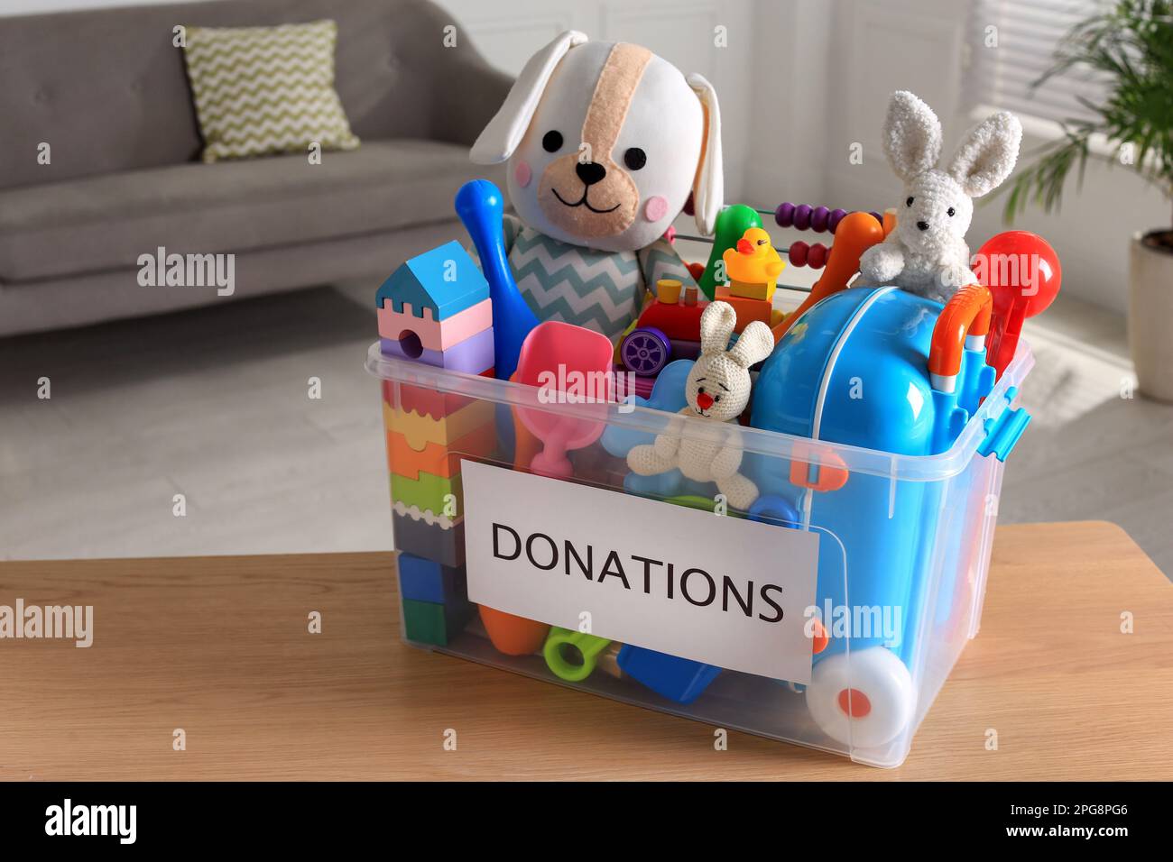 Child donation box toys hi-res stock photography and images - Alamy