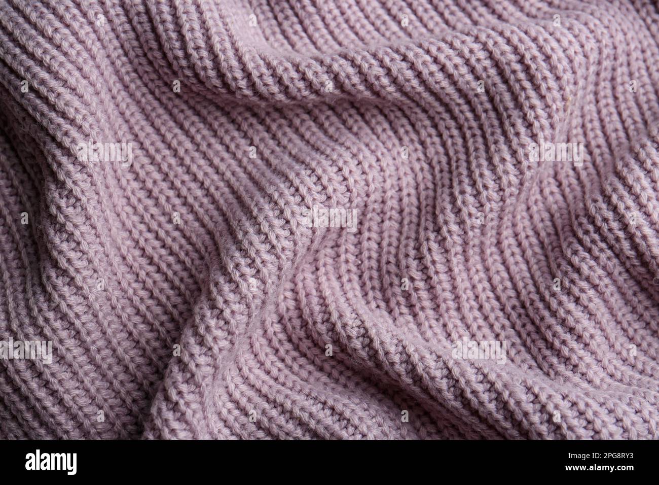 Beautiful violet knitted fabric as background, top view Stock Photo - Alamy