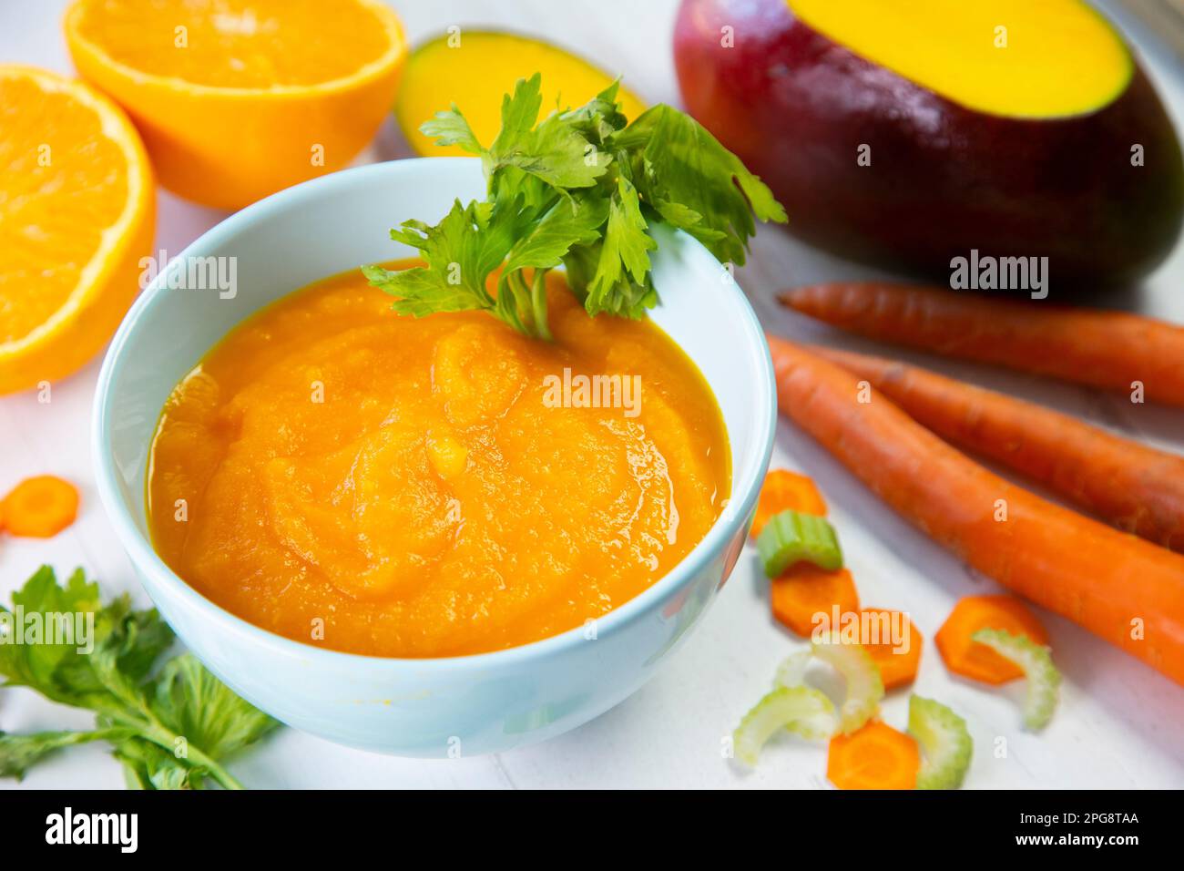 Cold carrot and mango soup Stock Photo - Alamy