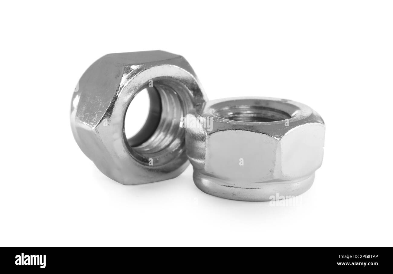 Two metal nyloc nuts on white background Stock Photo - Alamy