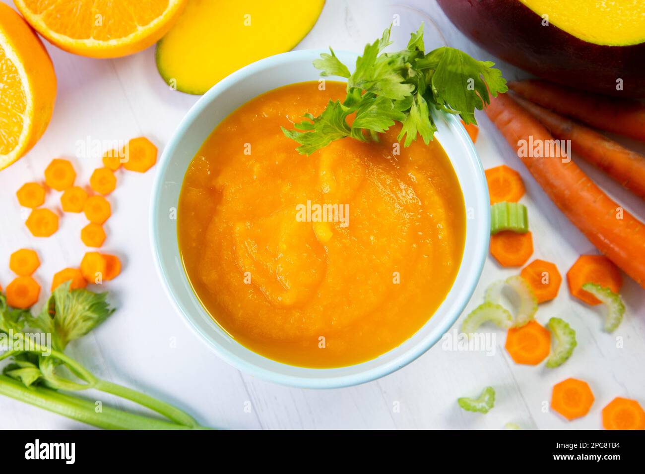 Cold carrot and mango soup Stock Photo - Alamy