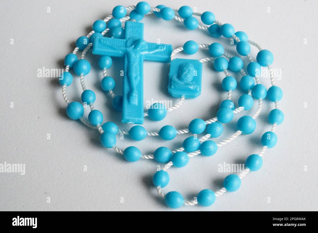 In this Illustration.Light blue plastic religious rosary Stock Photo ...