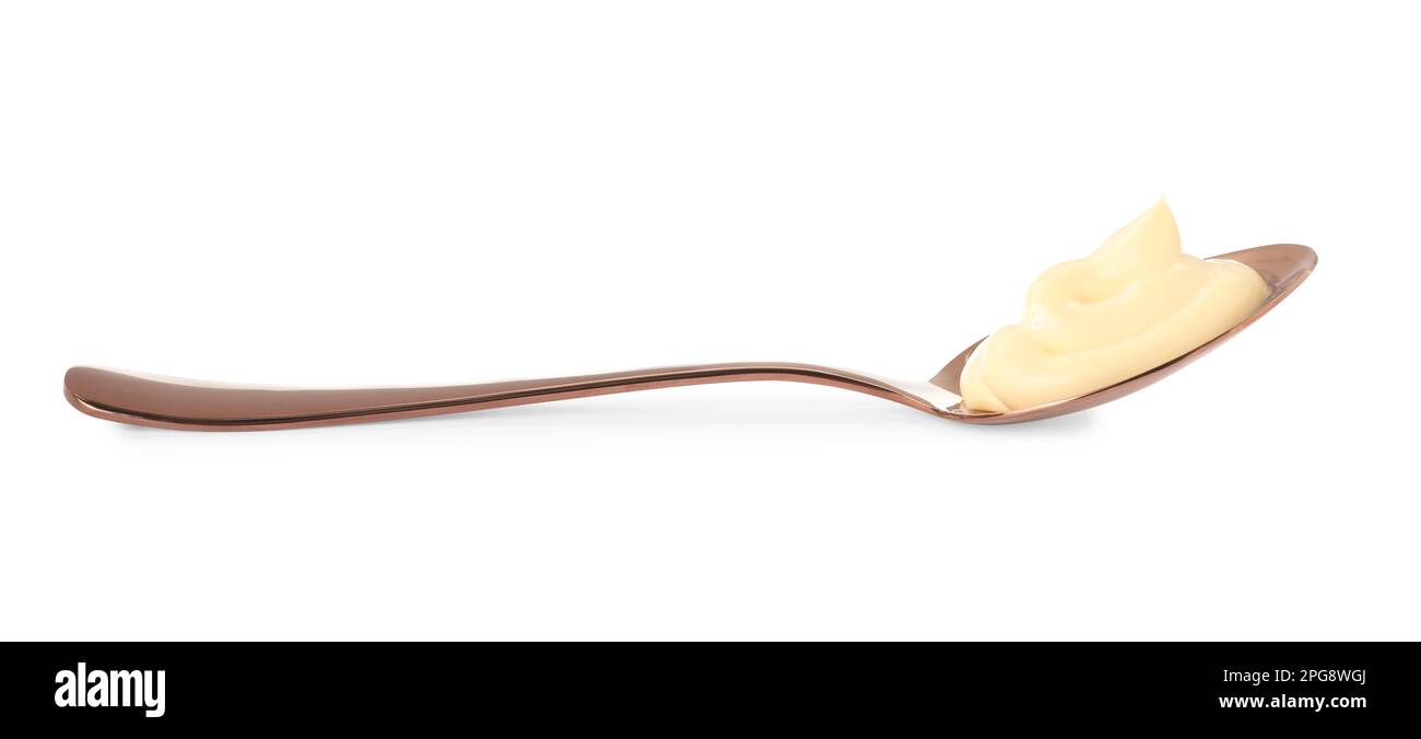 Spoon with tasty mayonnaise isolated on white Stock Photo - Alamy