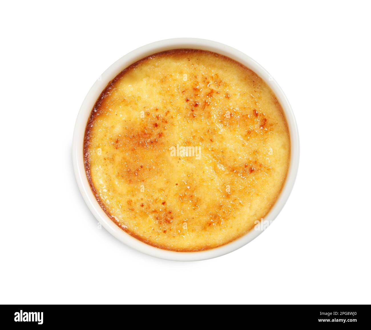 Delicious creme brulee in ceramic ramekin isolated on white, top view ...