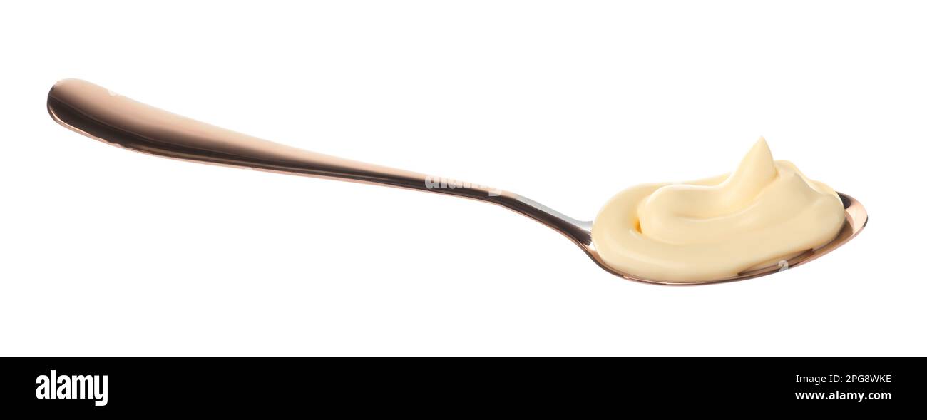 Spoon with tasty mayonnaise isolated on white Stock Photo - Alamy