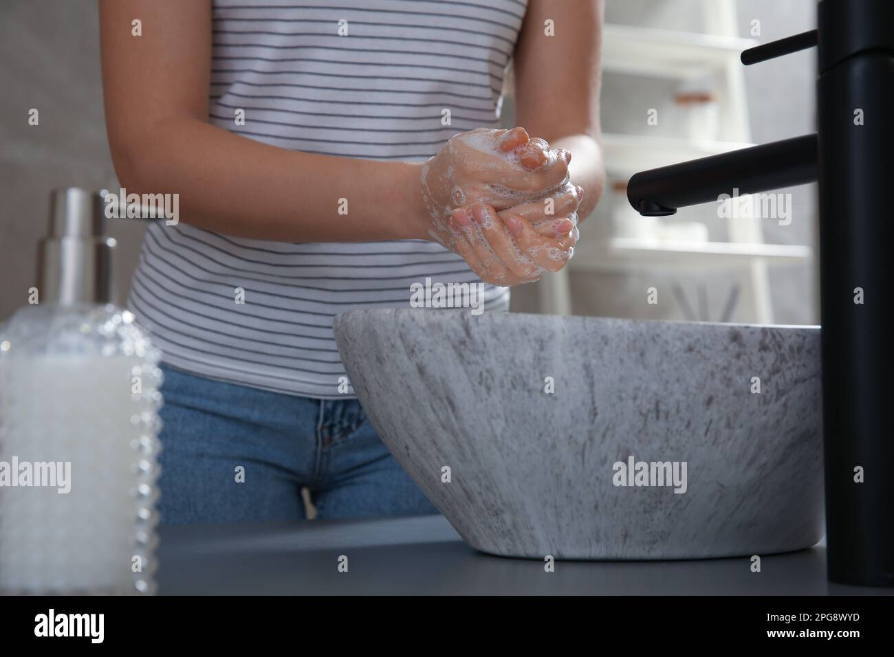 Woman washing hands with liquid soap in bathroom, closeup Stock Photo ...