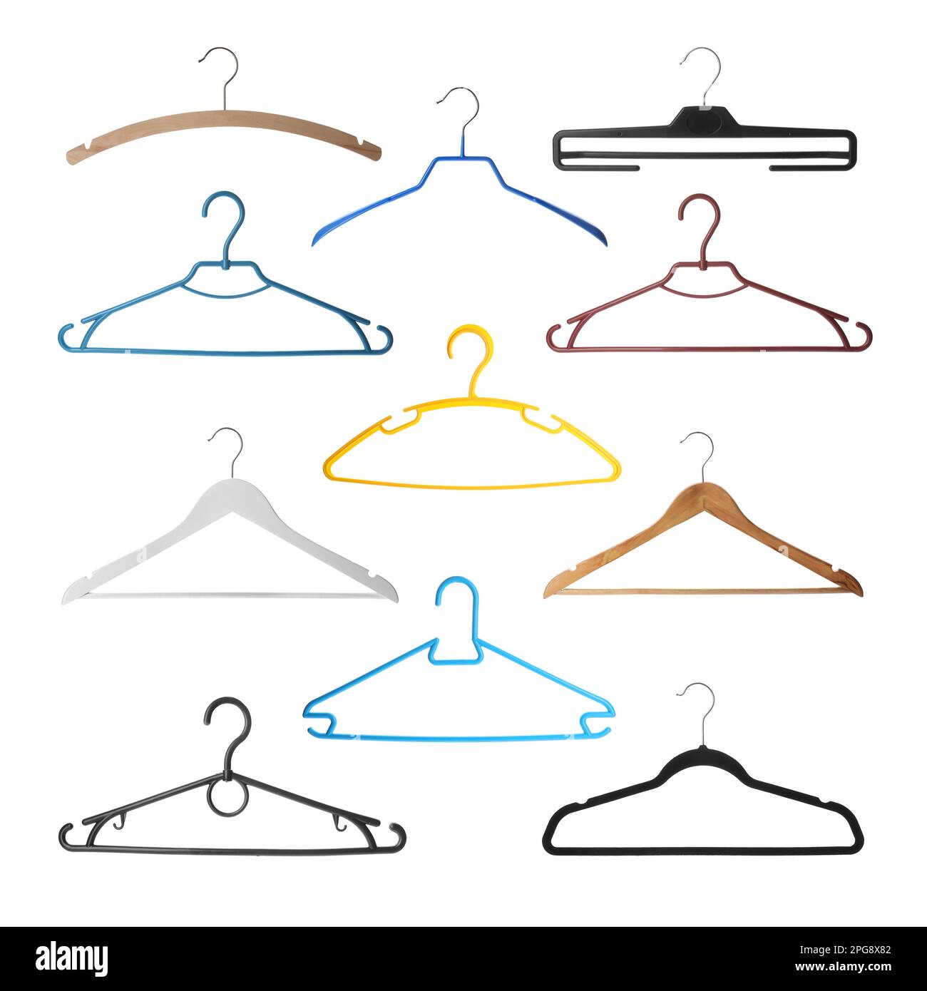 Set with different empty hangers on white background Stock Photo - Alamy