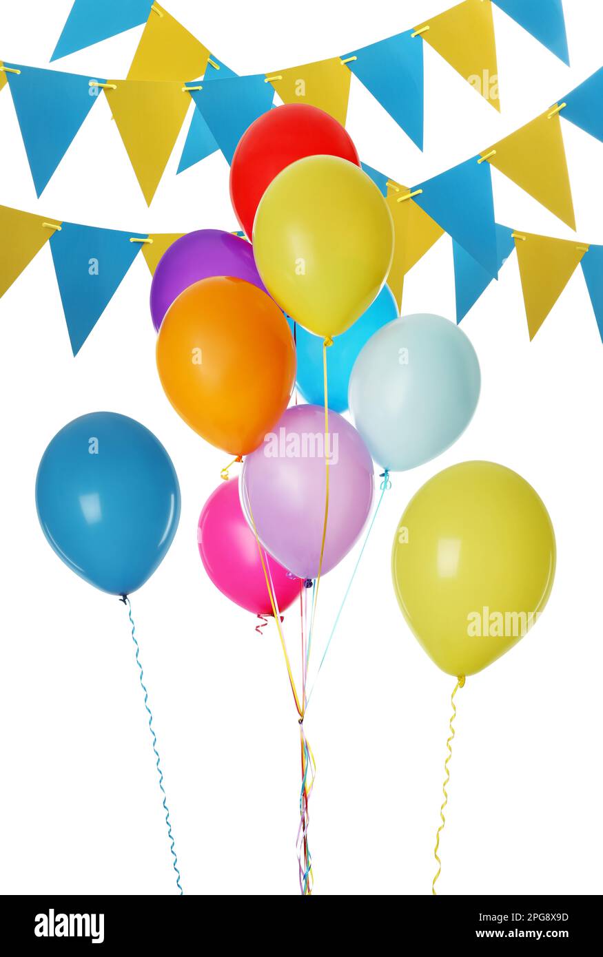 Colorful balloons and decorative bunting flags on white background ...