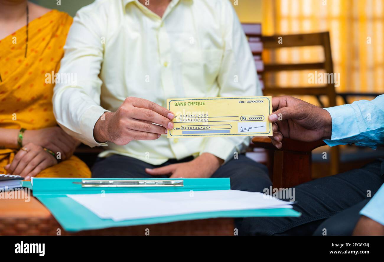 Compensation cheque hi-res stock photography and images - Alamy