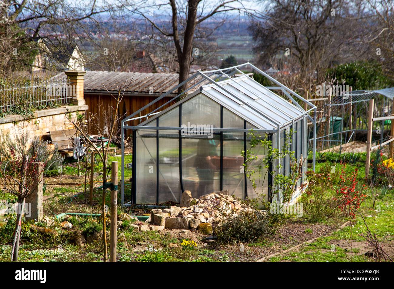 Greenhouse in a beautiful kitchen garden Stock Photo - Alamy