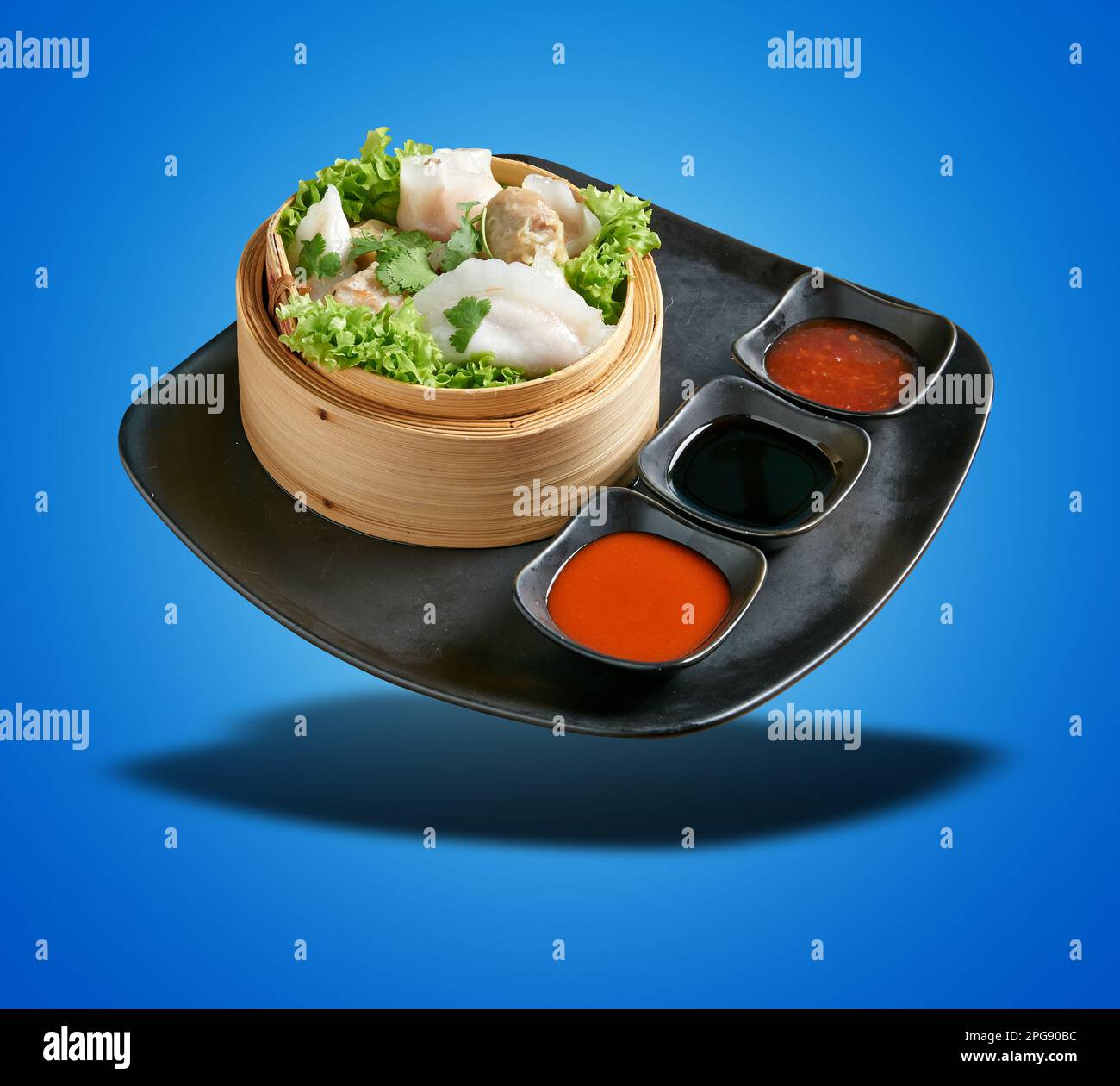 Floating Dim Sum in Bamboo Basket on blue gradient background Stock ...