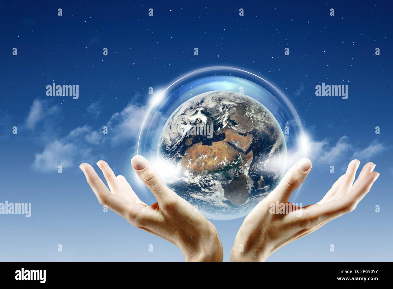 Earth is our Home. Blue Planet in human hands. Abstract eco and ...