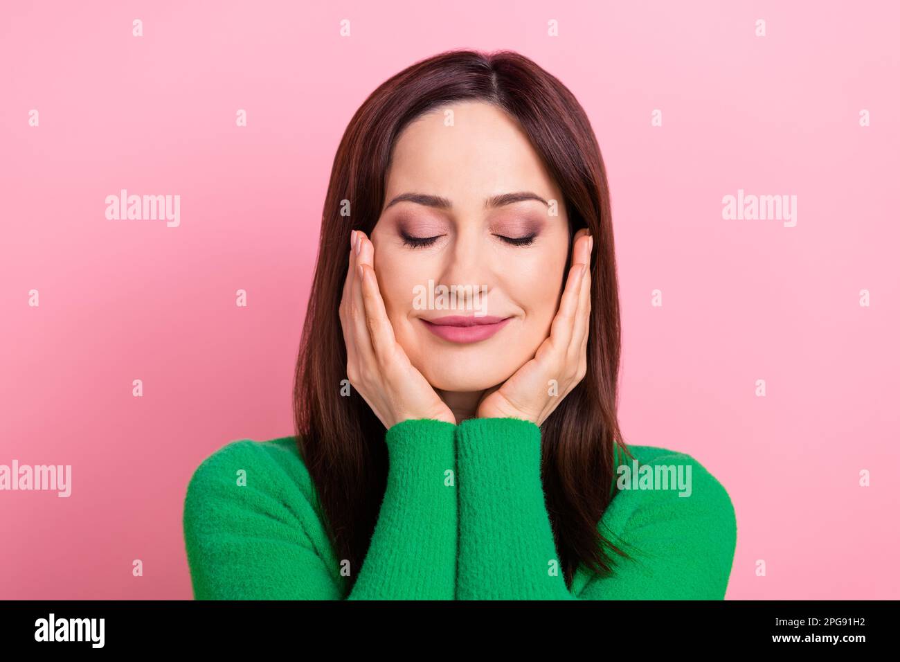 Photo of calm pretty person closed eyes hands touch cheeks isolated on ...