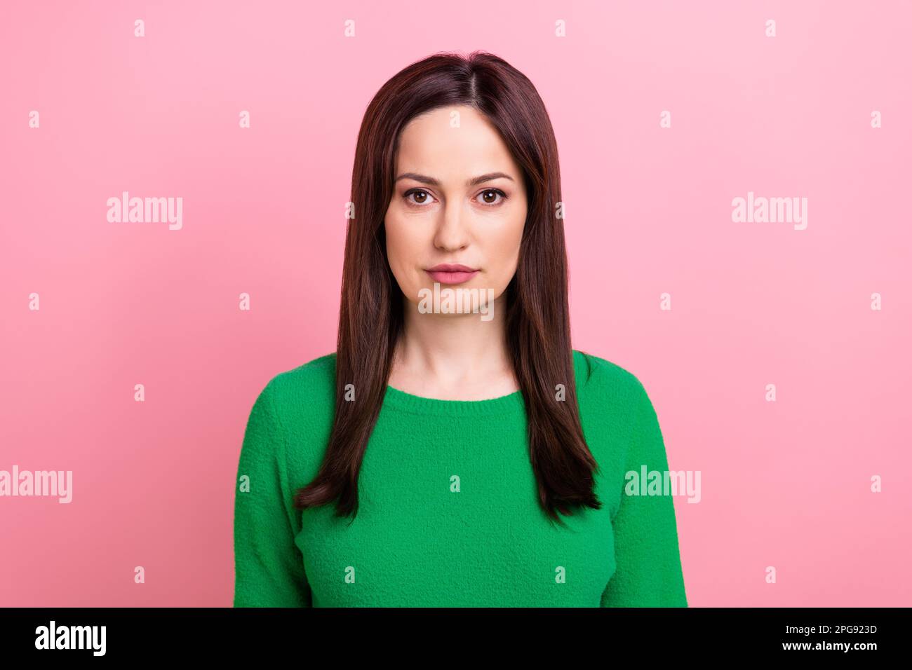 Photo of serious confident woman wear green sweater looking you ...