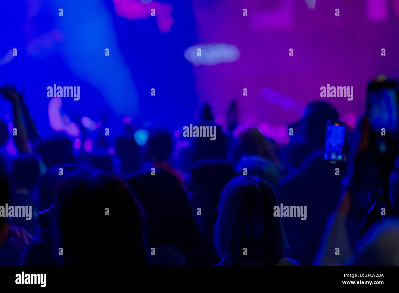 Abstract blur background of people spectators silhouettes, back view ...