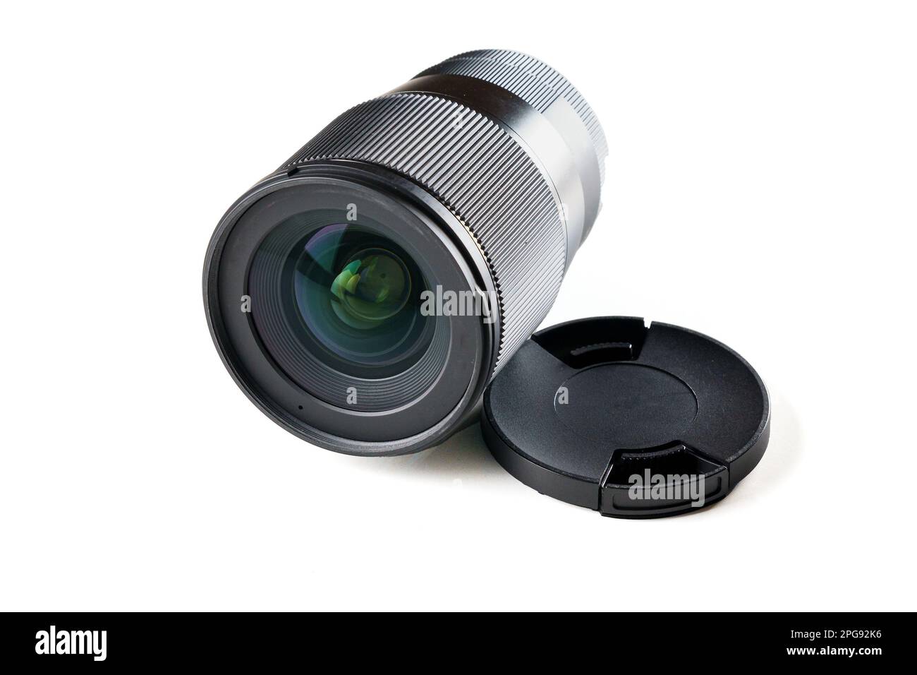 Camera and video camera lens close-up on a white background and cap ...