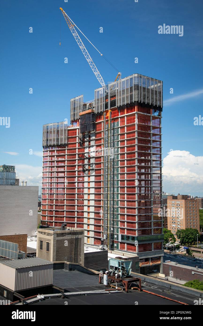 A large building in the process of being constructed on the corner of a ...