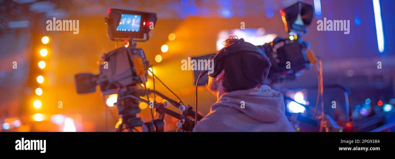 operator filming a concert for TV and the Internet Stock Photo - Alamy