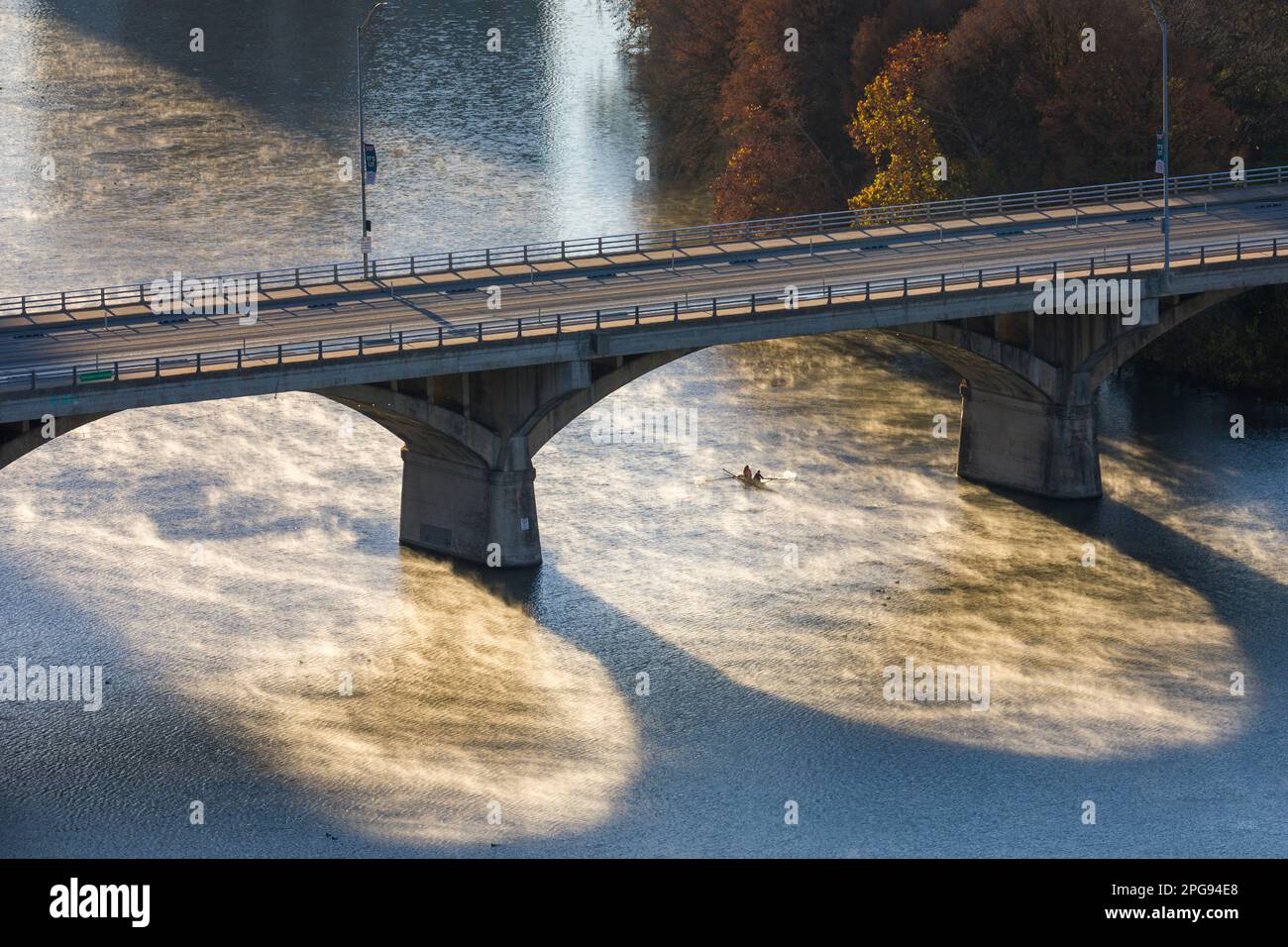 Sculling on Ladybird Lake in morning mist in Austin, Texas with ...
