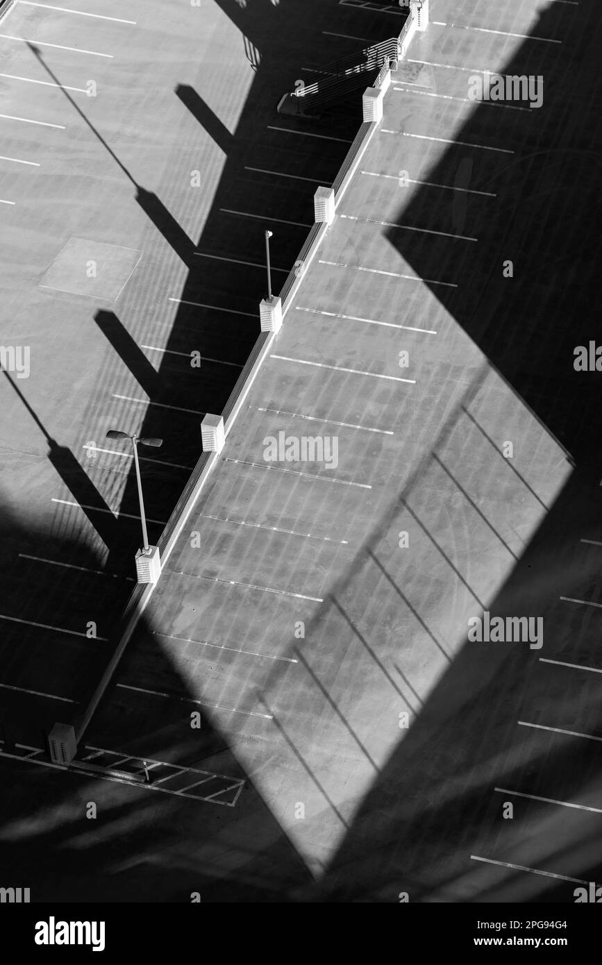 Elevated abstract B&W view on empty parking ramp with shadows in Austin ...