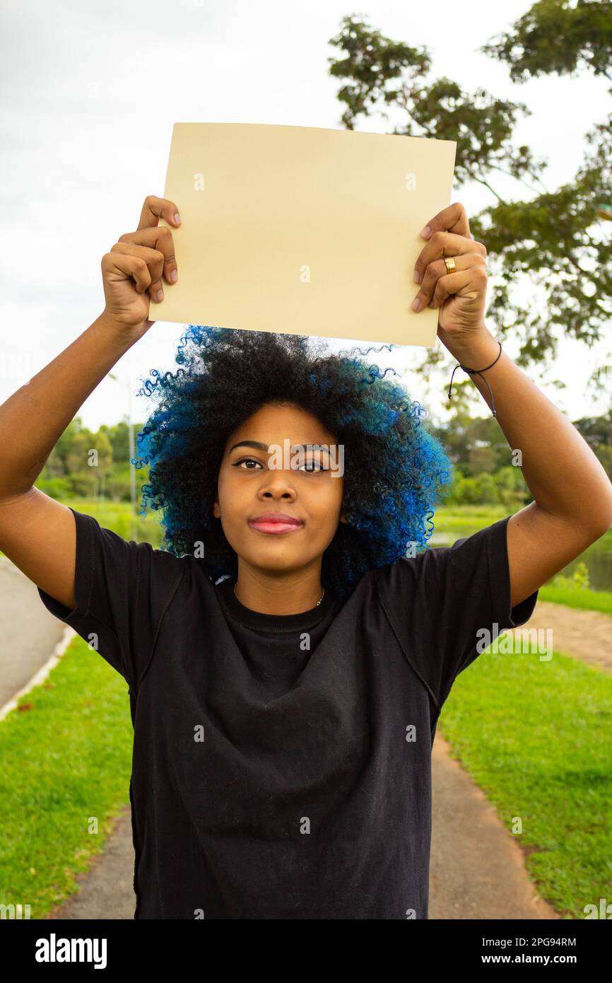 Black woman holding sign black lives matter hi-res stock photography ...