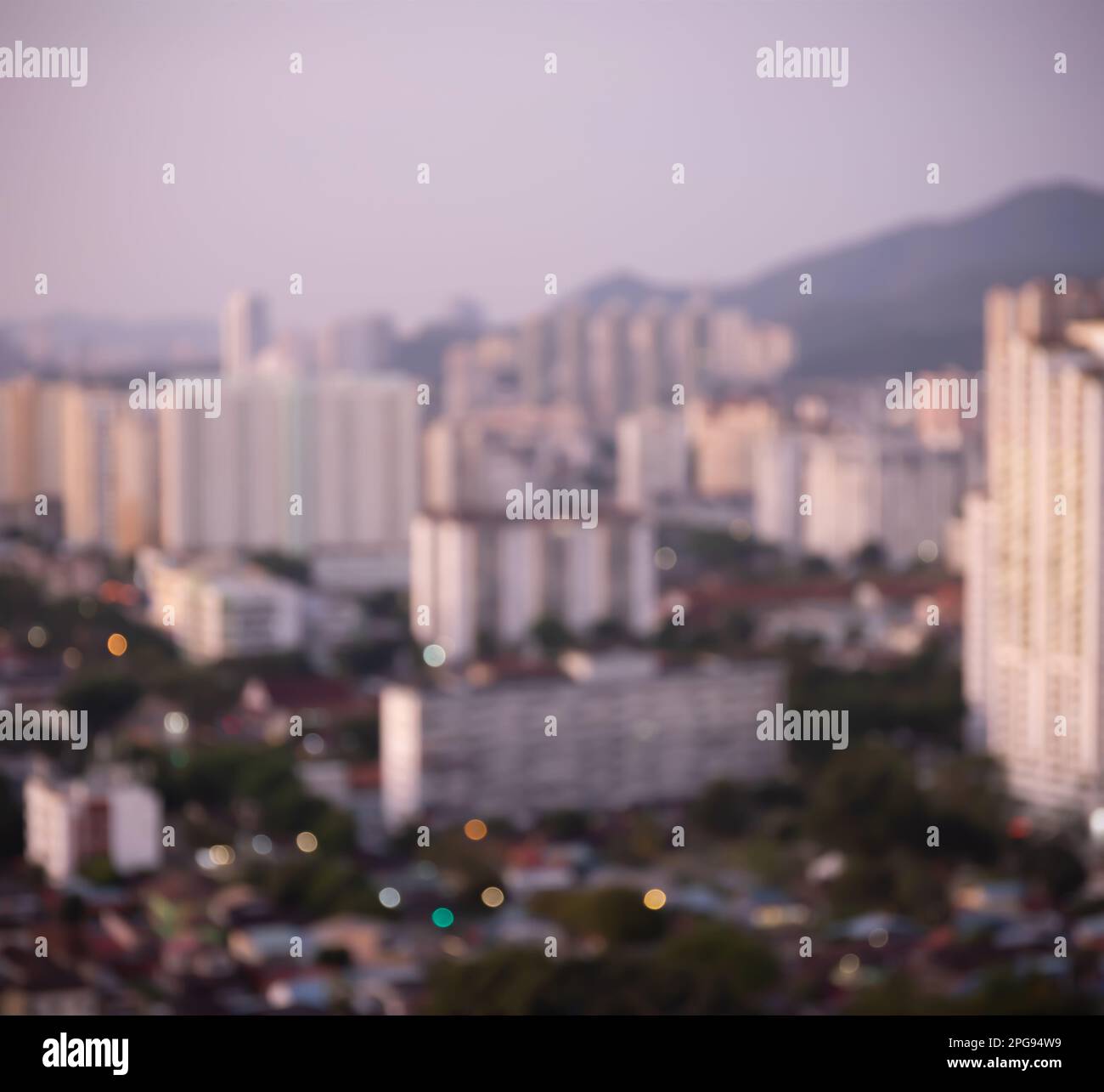 Blurry focus city hotel corporate building in blue morning business ...