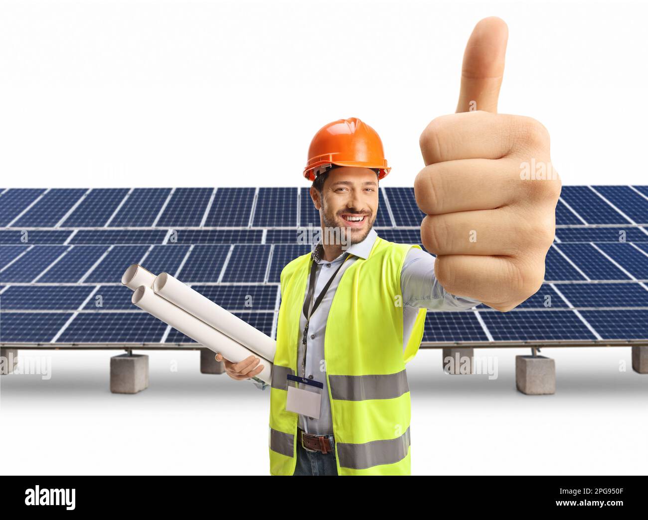 Male engineer gesturing thumbs up in front of a photovoltaic power ...