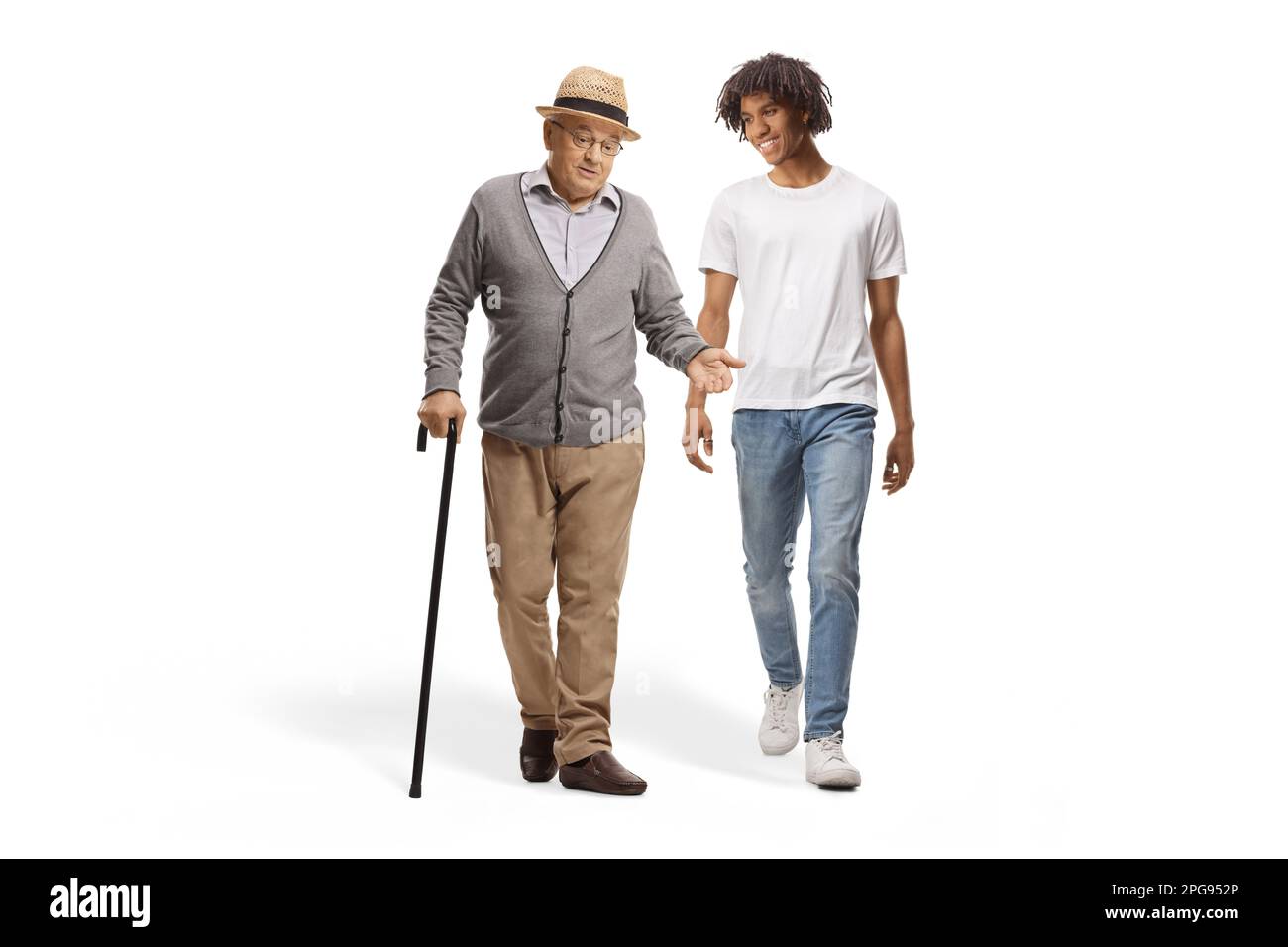 Full length portrait of an african american guy smiling and walking ...