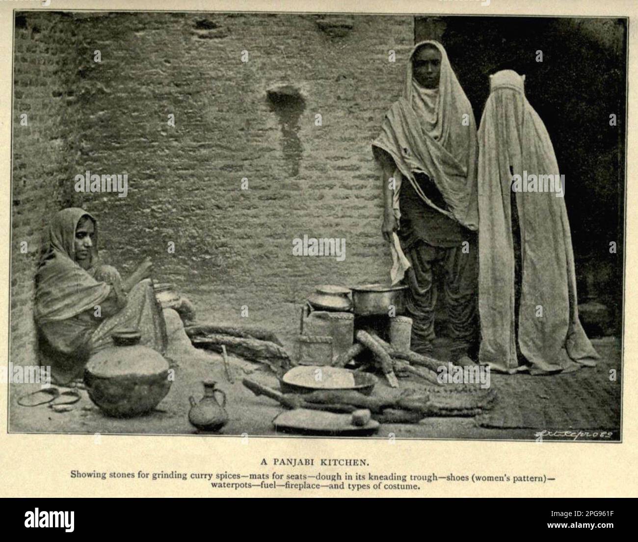 Women wearing traditional clothes in a Punjabi kitchen: 1899 Stock ...