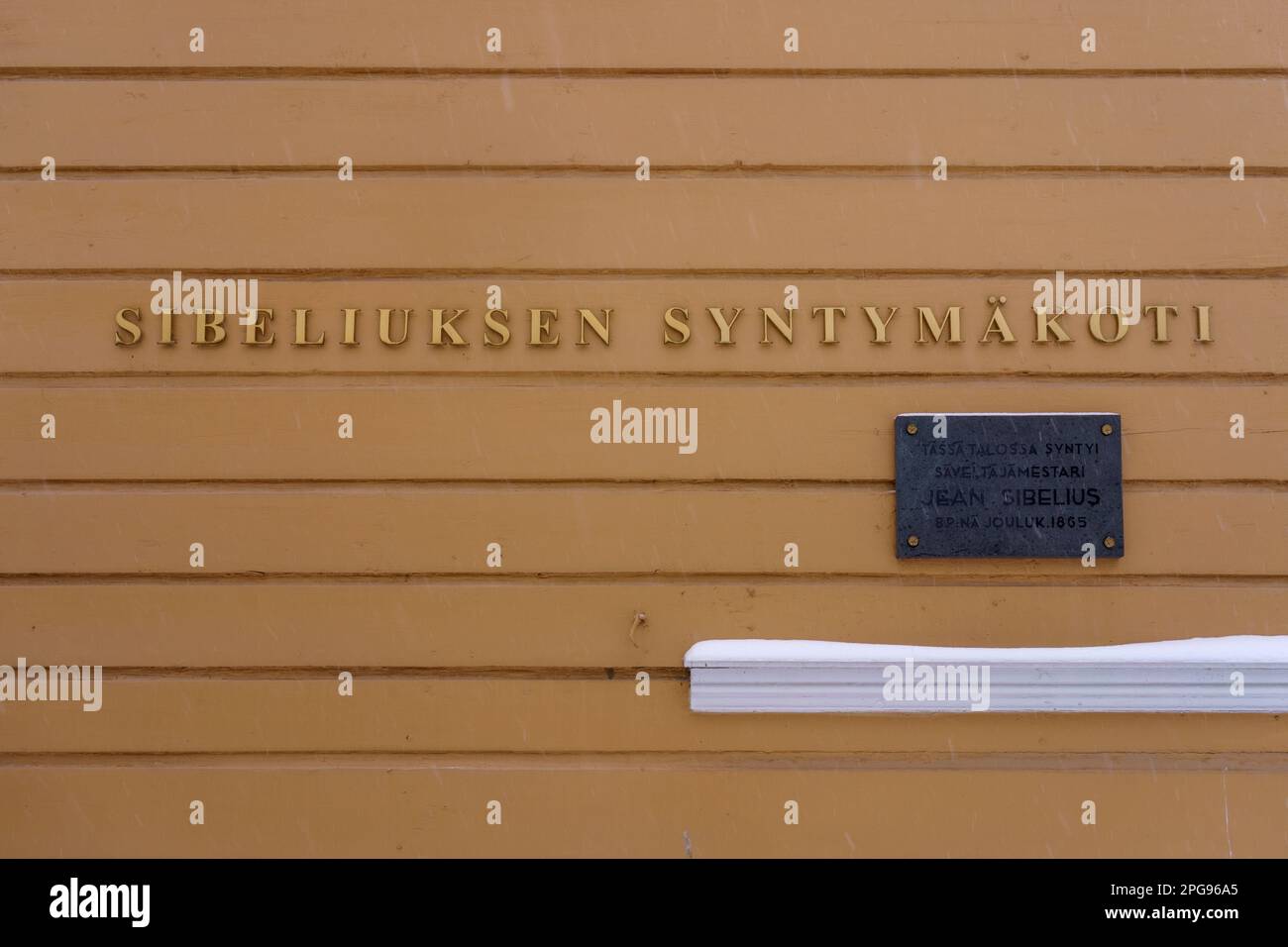 A sign saying Birthplace of Jean Sibelius in Finnish on the wall of the ...