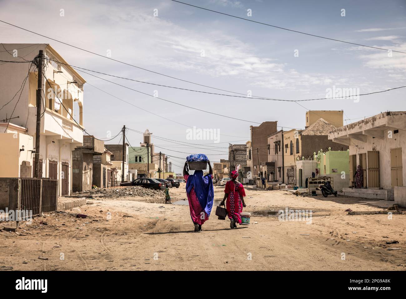 Traditional and simple everyday people live in the poorer neighborhoods ...