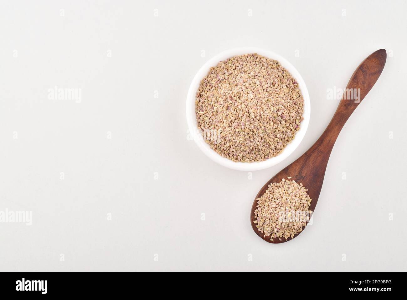 Ajwain spice in spoon on white background, bishop seeds Stock Photo - Alamy