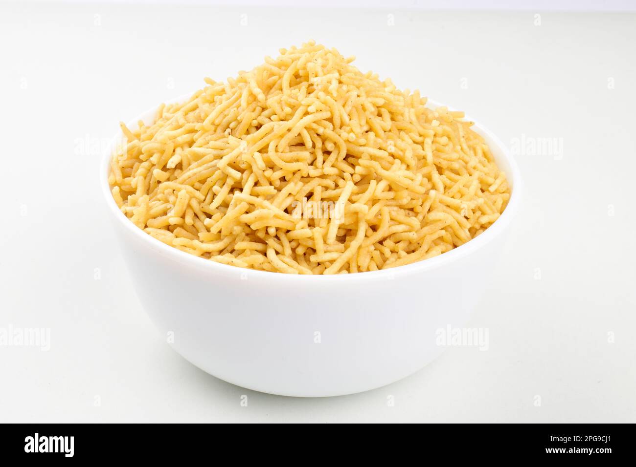 Bhujia namkeen in bowl isolated on white background Stock Photo - Alamy