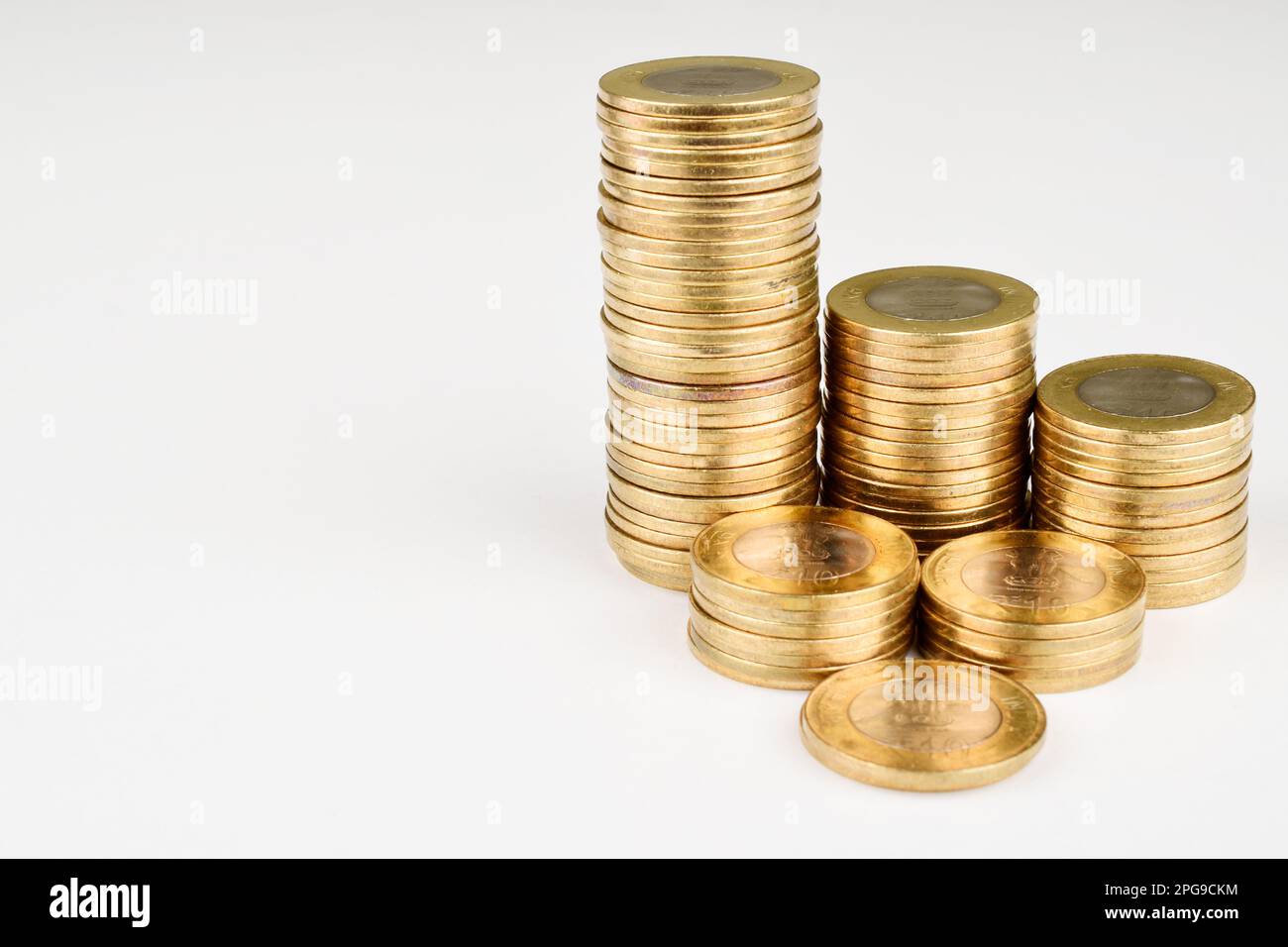 Coin stack isolated on white background, profit concept Stock Photo - Alamy