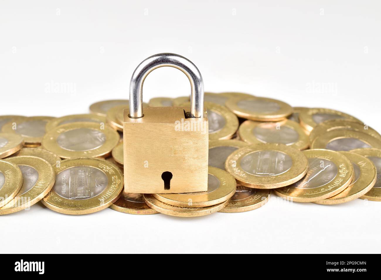 Lock with coin on white background, money security concept Stock Photo ...