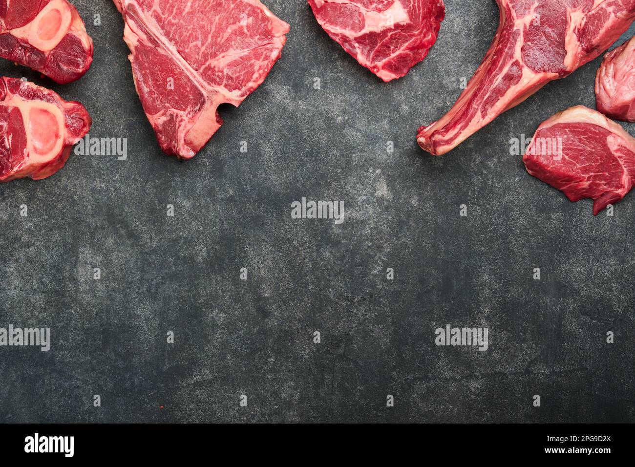 Raw prime steaks. Variety of fresh black angus prime meat steaks T-bone ...
