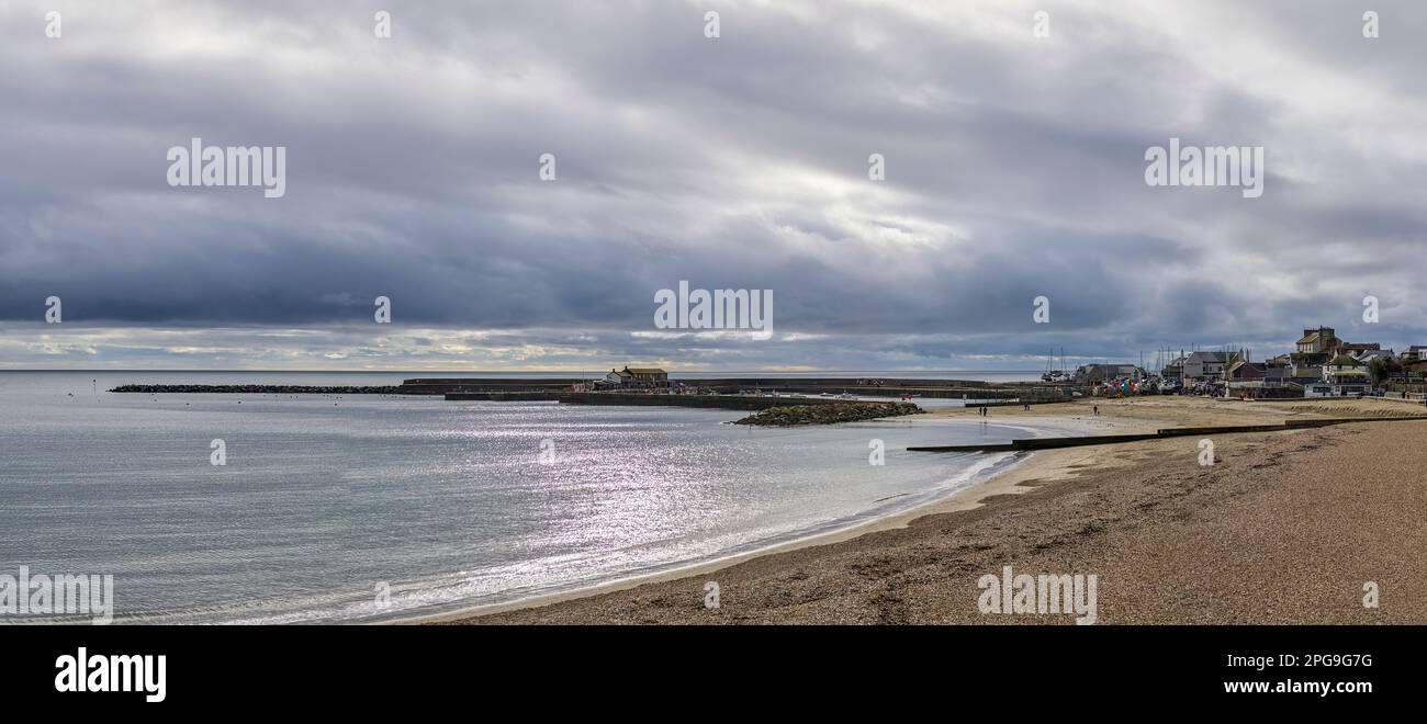 Lyme Regis and the iconic Cobb breakwater to protect the harbour and ...