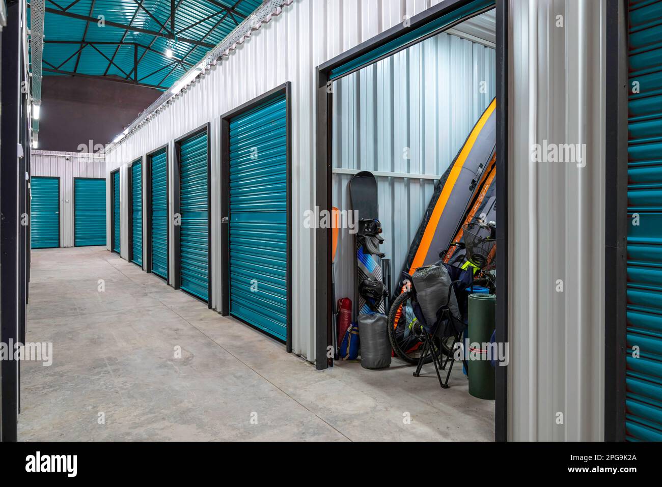 Outdoors activity items seen through the open door of the self storage ...
