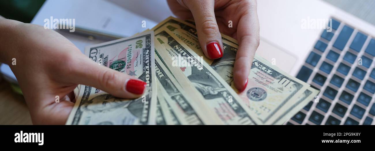 Keyboard dollar bills female hi-res stock photography and images - Alamy