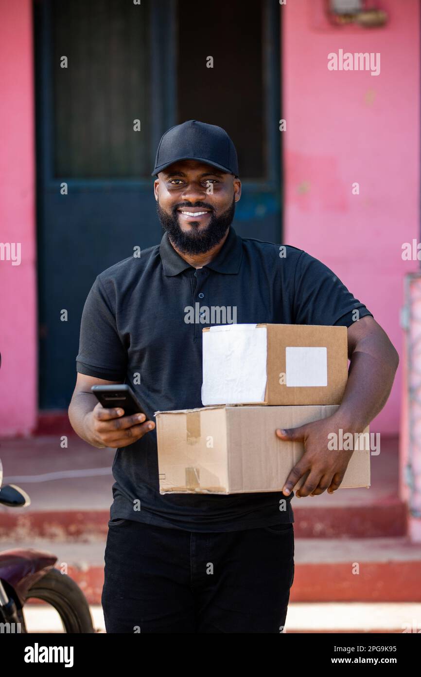 African Delivery Courier Man from Local Postal Shipping Service ...