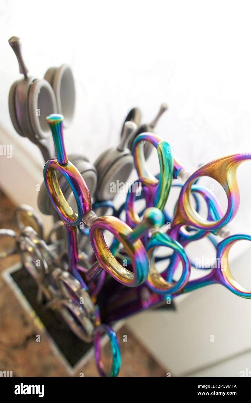 A lot of colorful scissors in a cup on a table, from above view Stock ...