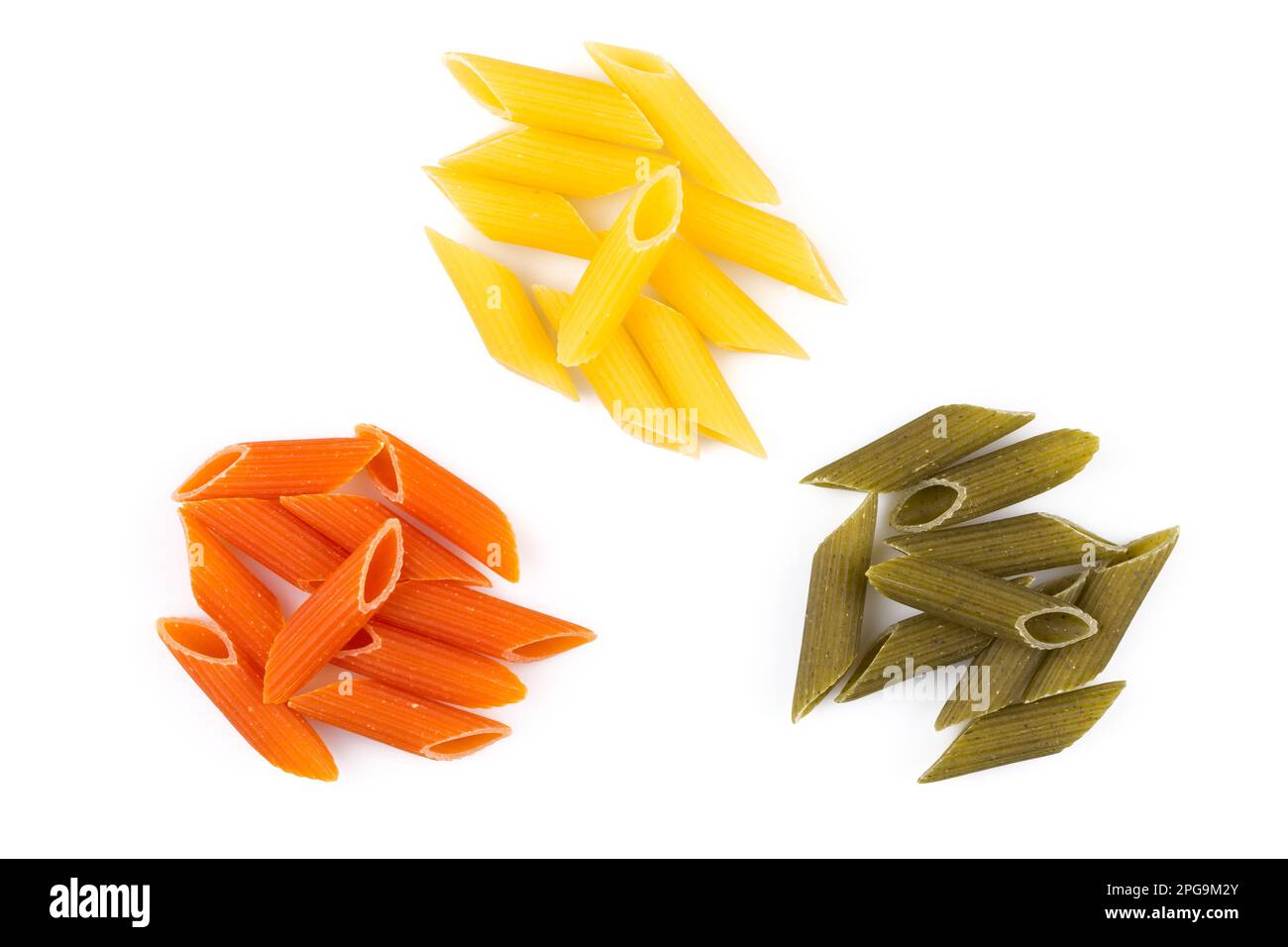 Raw colored pasta isolated on white background. Tomato, spinach and ...