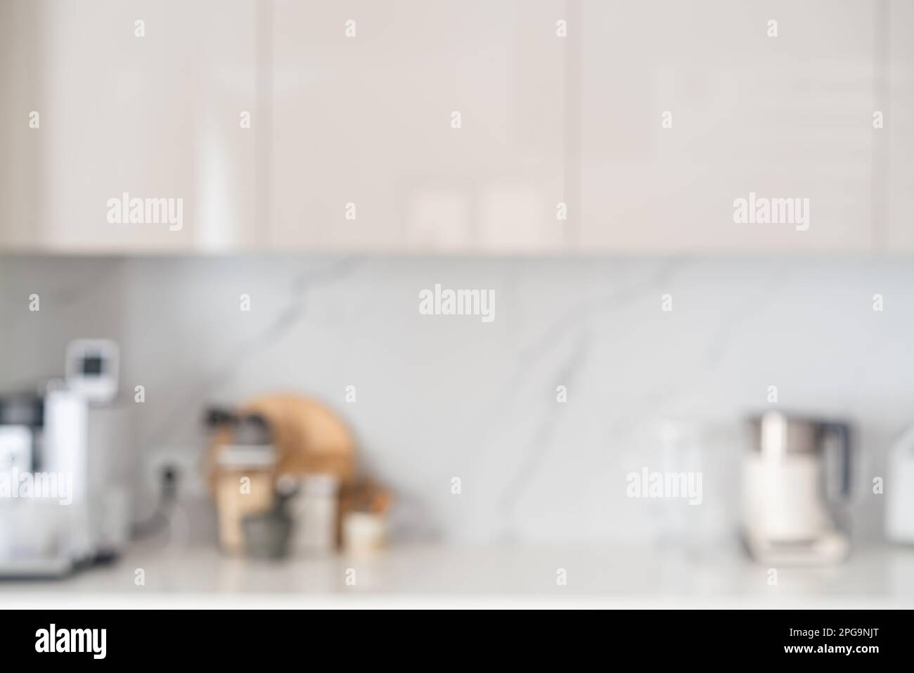 Blurred view of modern kitchen Stock Photo - Alamy