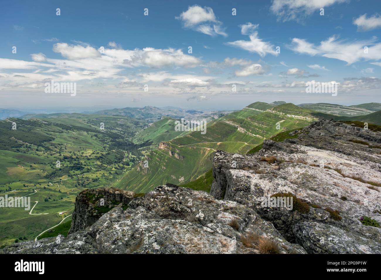 Karst landforms, steep slopes and green valley in the Cantabrian ...